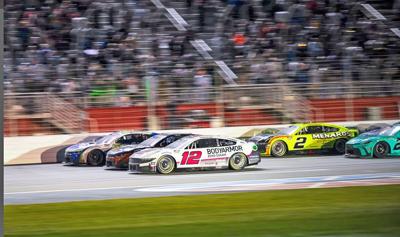 Suarez wins three-wide photo-finish thriller at Atlanta Motor Speedway ...