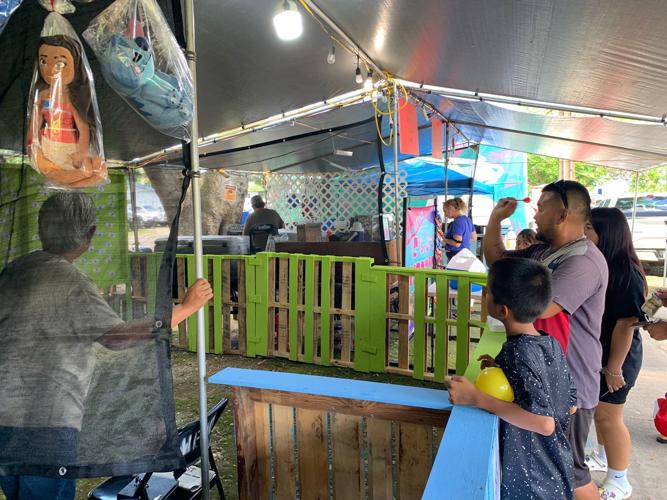 Residents, visitors enjoy games and activities at the Crab Festival in ...