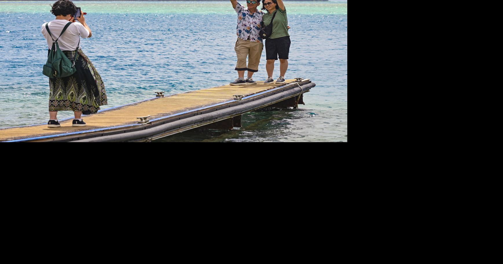 Guam's half-year arrivals still 50% down | News | guampdn.com