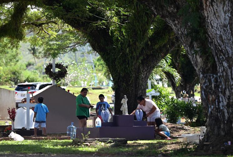 All Souls’ Day preparations at Limtiaco Cemetery | Multimedia | guampdn.com