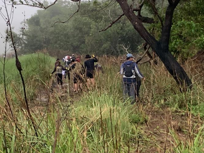 Faithful make Good Friday trek in the mud | News | guampdn.com