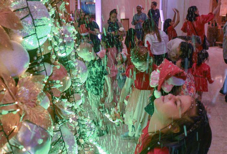 PHOTOS: Children play in ‘falling snow’ at Hyatt Regency Guam ...