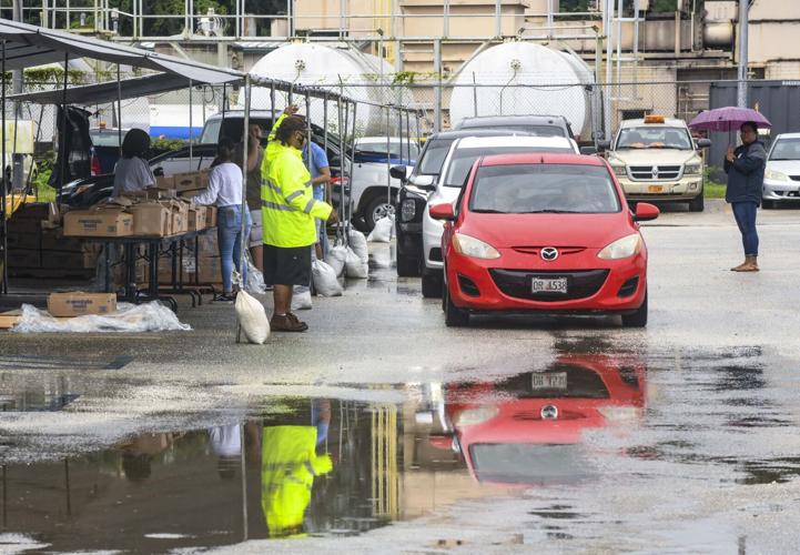 Yigo residents issued food commodities during distribution | News ...