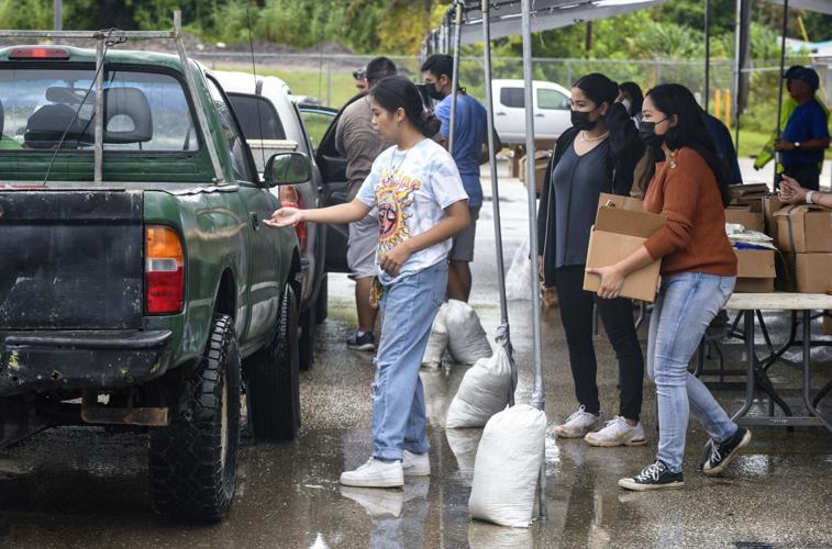Yigo residents issued food commodities during distribution | News ...