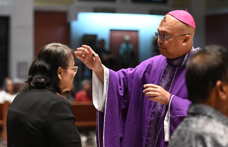 Catholics receive a cross of ashes on their foreheads on Ash Wednesday | Multimedia | guampdn.com