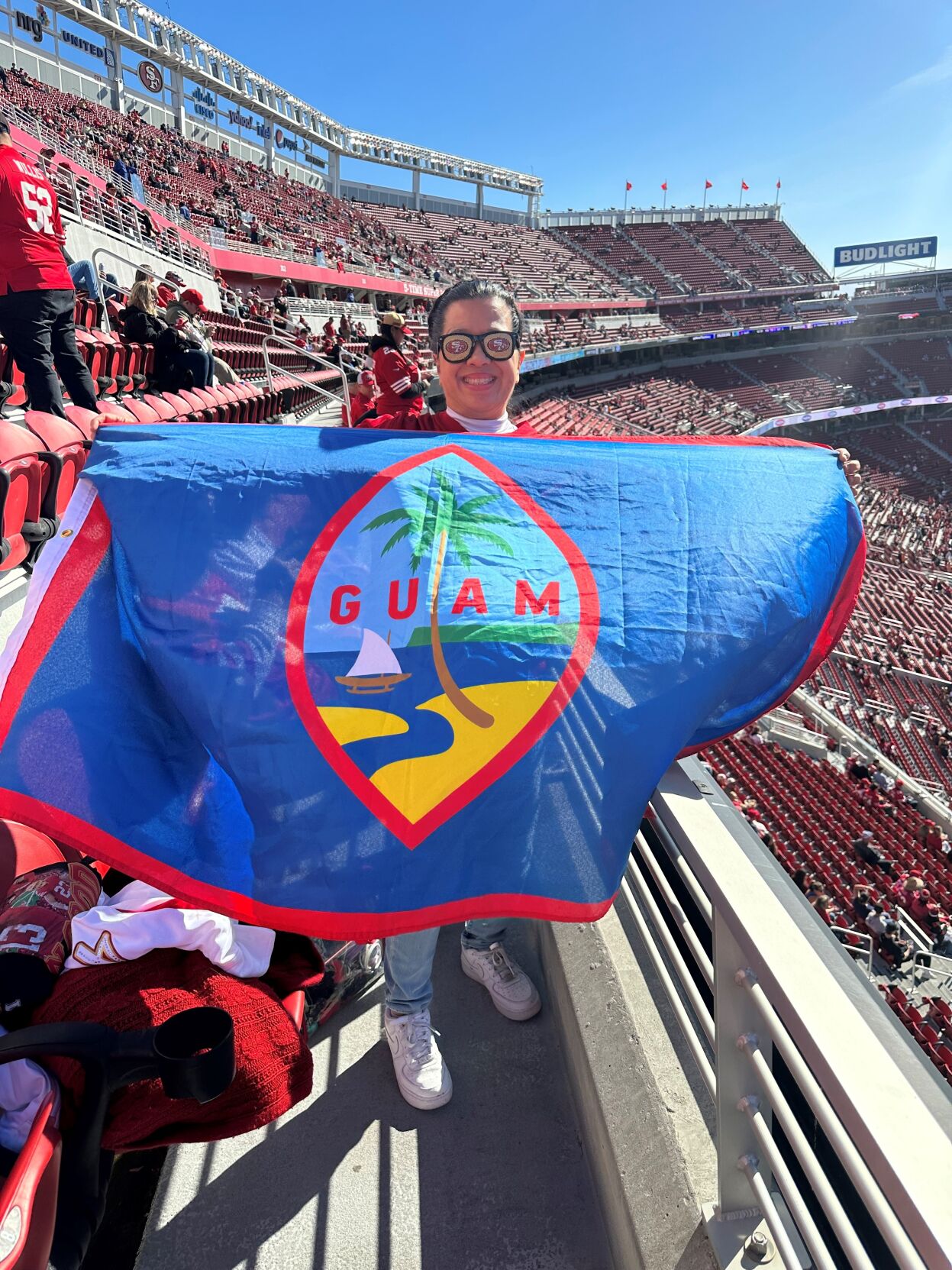 Daga, Morita families proudly display the Guam flag at NFL game ...