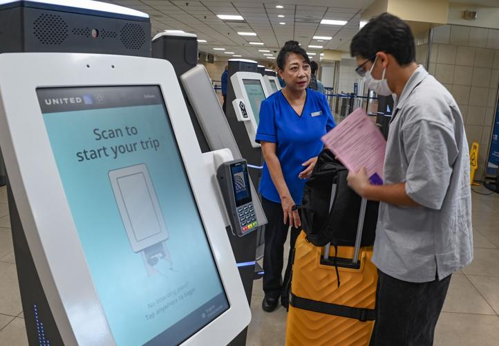 PHOTOS: United Airlines unveils new electronic check-in system ...
