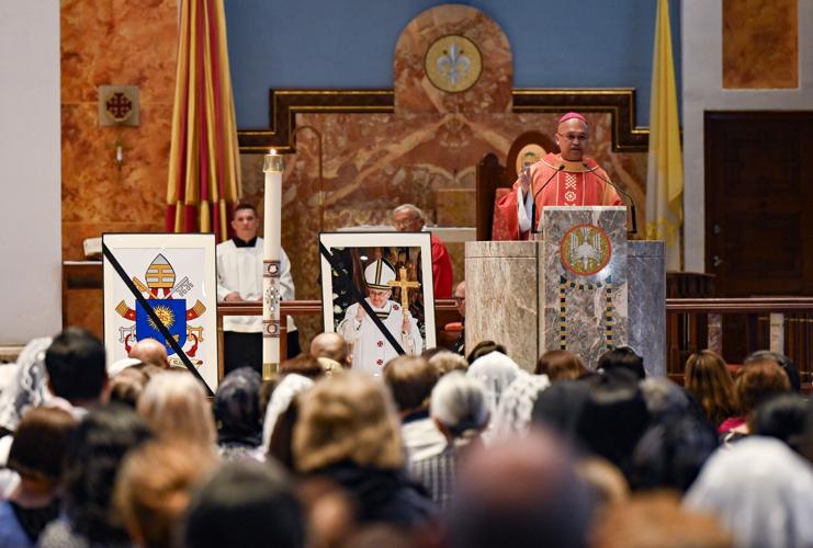 PHOTOS: Guam residents come out to pray, mourn Pope Francis ...