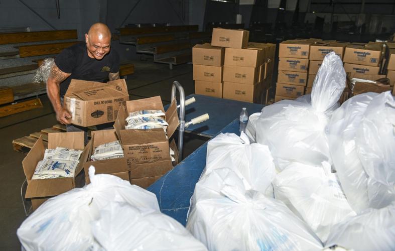 Yigo residents issued food commodities during distribution | News ...