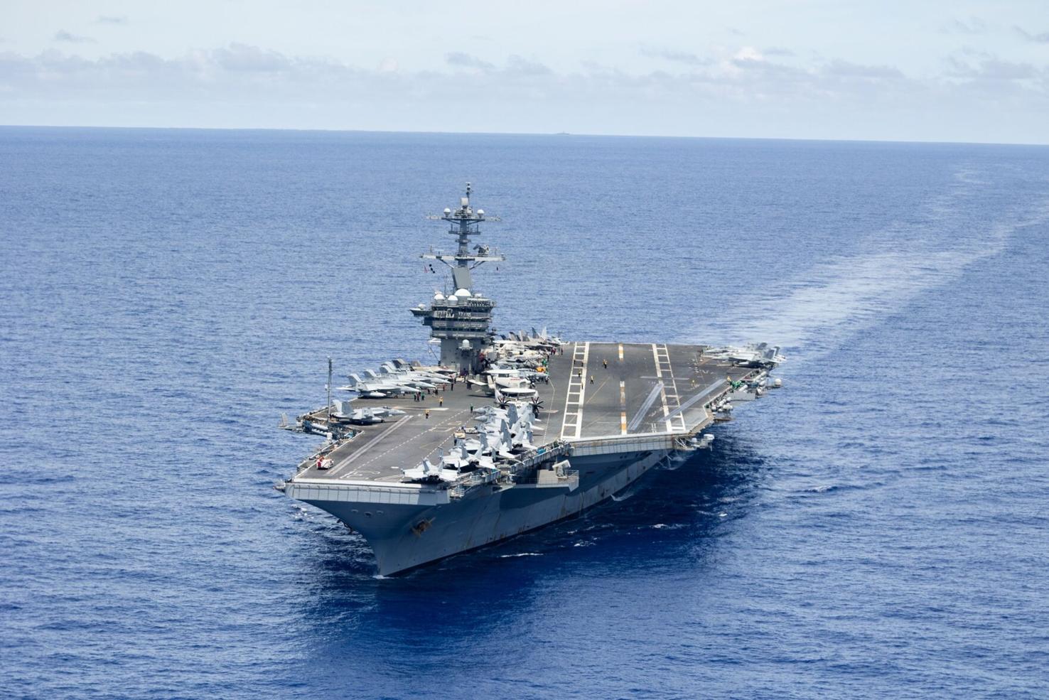 'Good to be home': George Washington strike group arrives on Guam ...