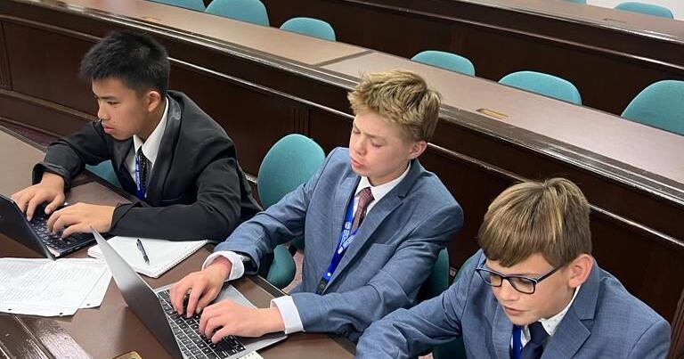 SJS students in committee session | | guampdn.com