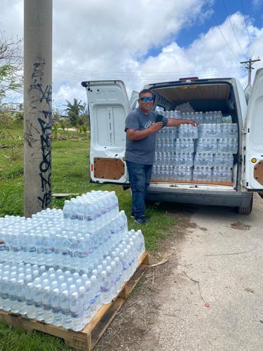 Guam businesses collaborate to distribute cases of clean, safe water ...