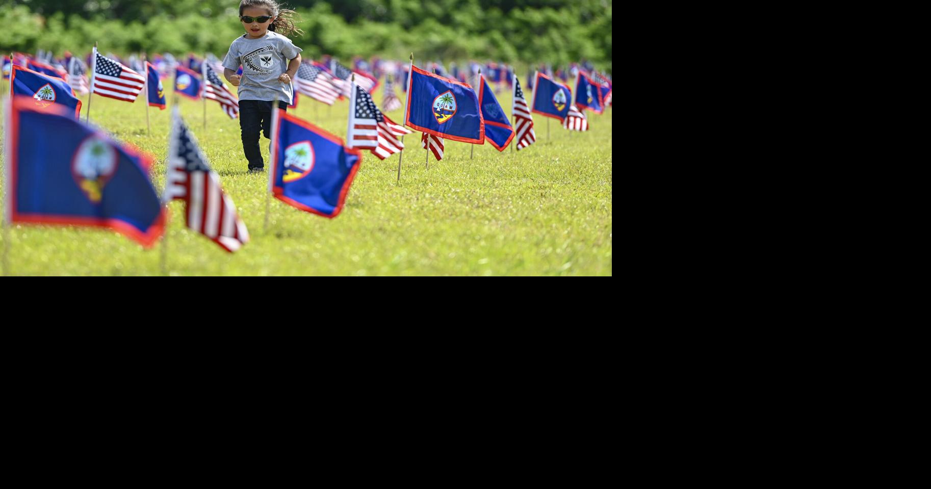 Flags planted to remember WWII fallen service members and CHamorus ...