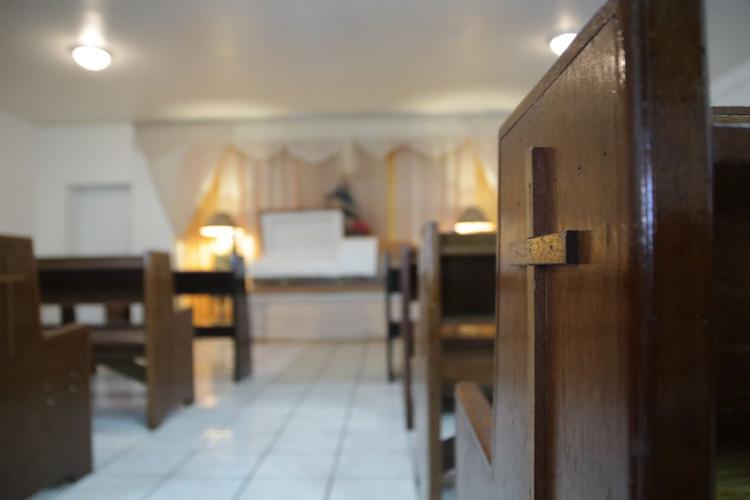 does a post mortem delay a funeral