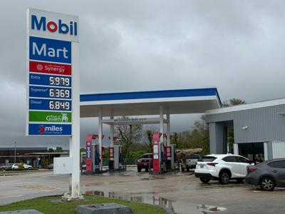 Regular gas drops 15 cents, below $6 again | News | guampdn.com