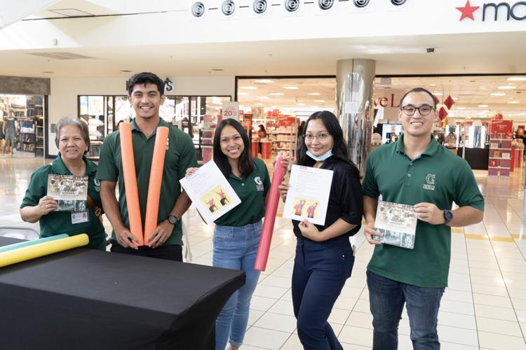 Micronesia Mall surprises Guam Running Club with a $1,000 donation ...