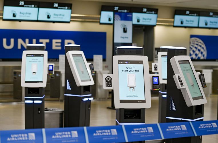 PHOTOS: United Airlines unveils new electronic check-in system ...