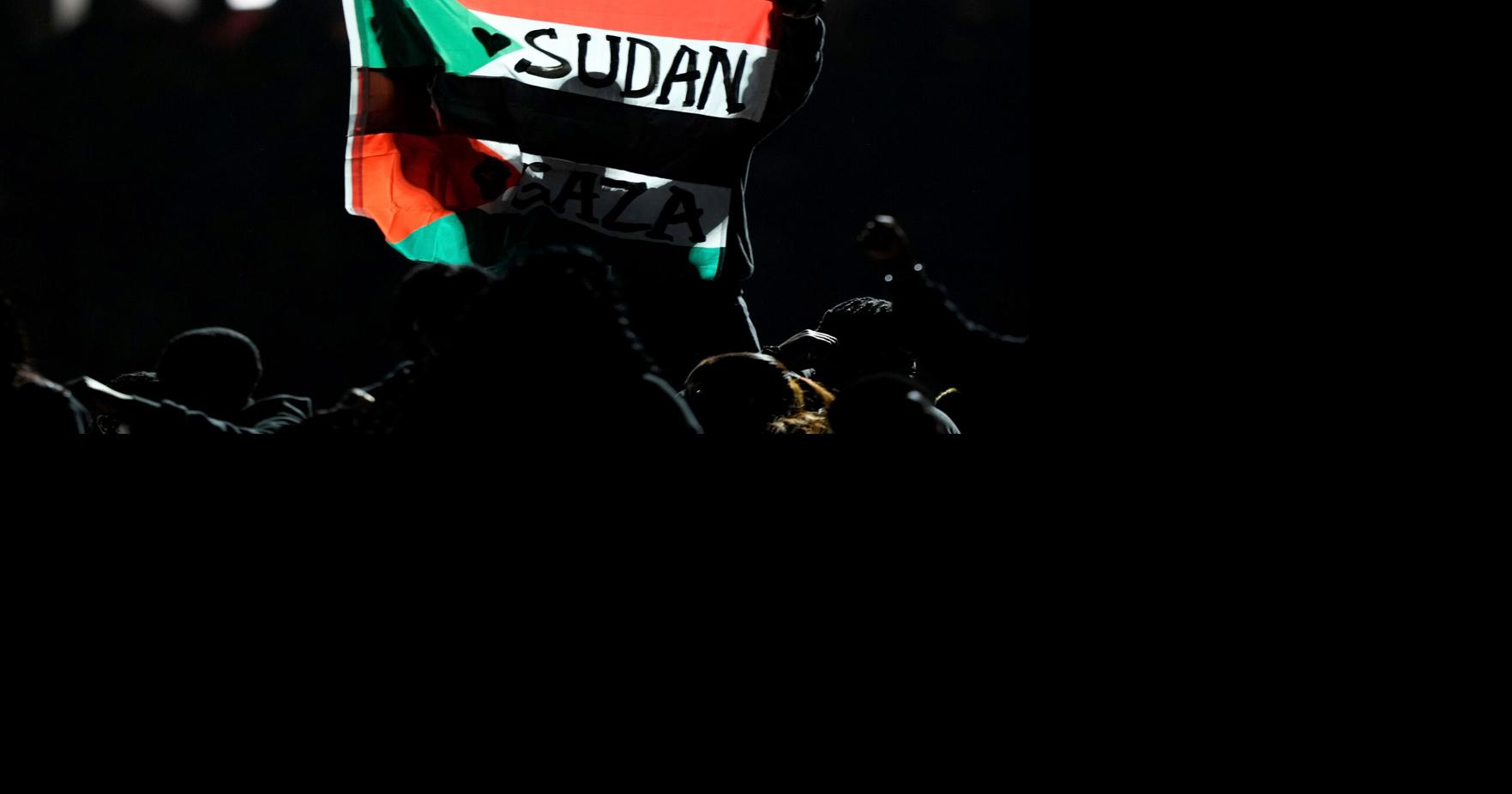 Super Bowl halftime performer who ran with a protest flag is found ...