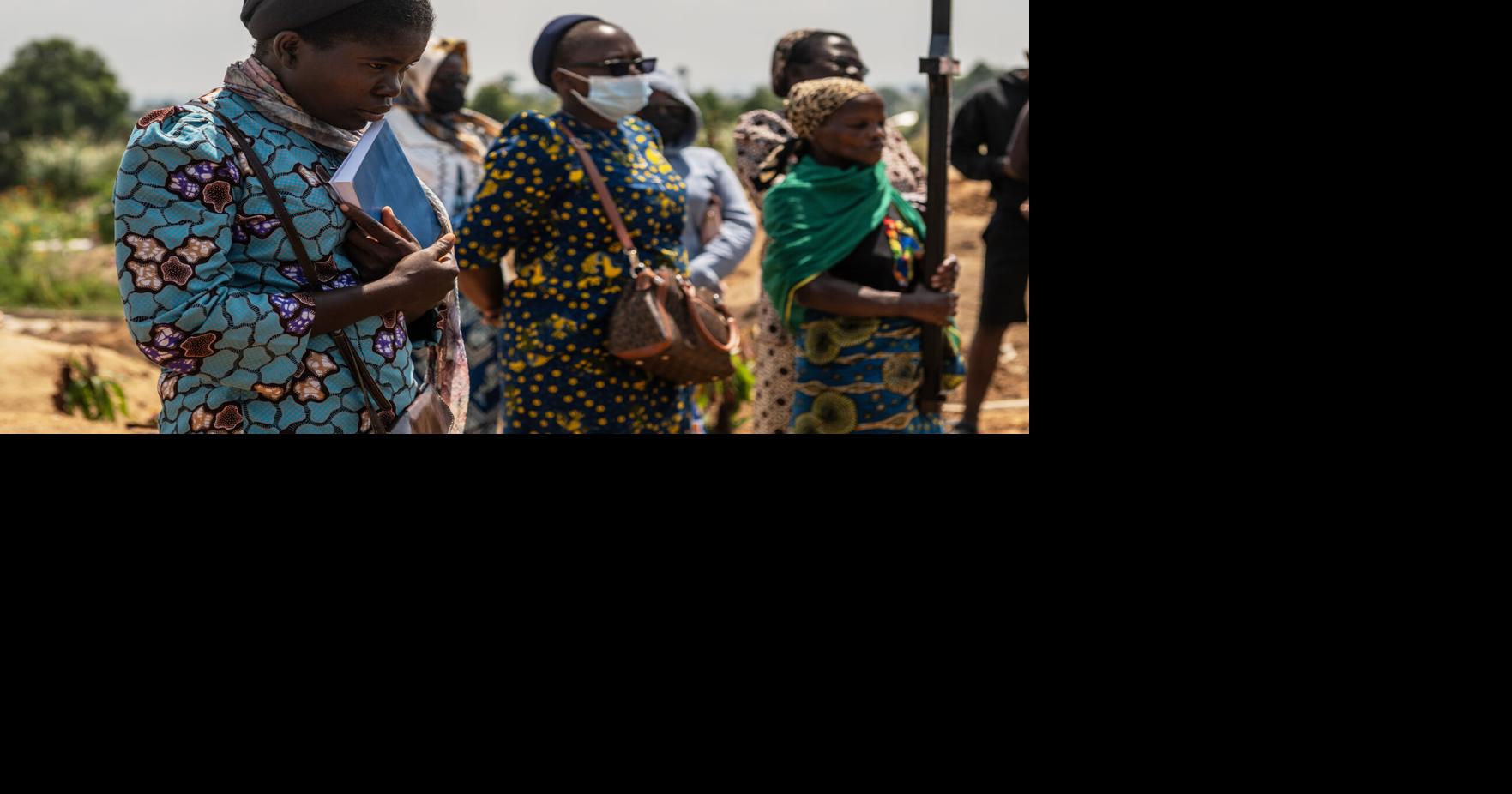 Mourners bury a 6-month-old Ebola victim in the Congo outbreak's third ...