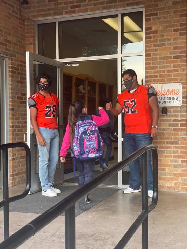 Guymon High School Football team greets elementary students Friday ...