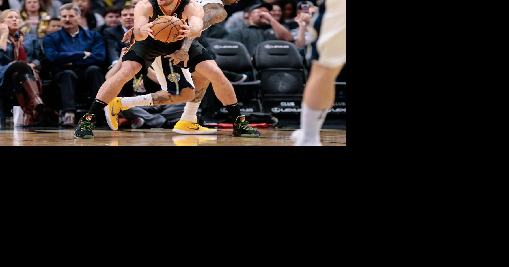 Hawks celebrate NBA season's midway point with win at Denver | Sports ...