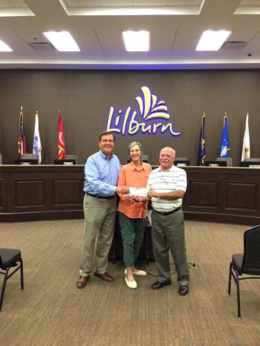 Lilburn CID repays loan used to help it get started | News ...