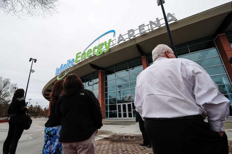Officials celebrate installation of new Infinite Energy Arena signs ...