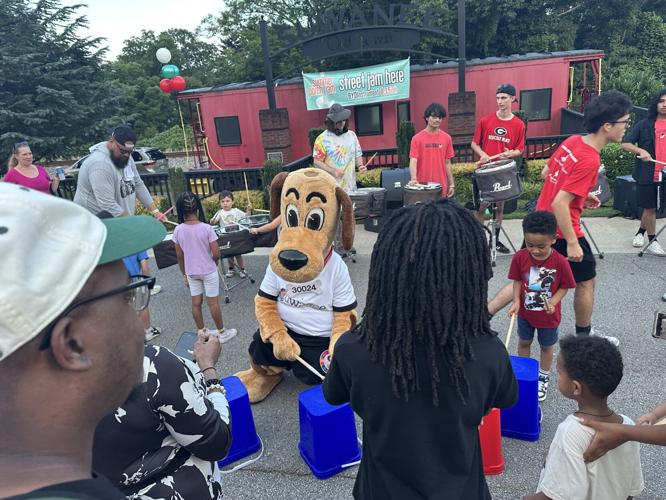 Music, community shine at record-breaking Summer Porch Jam in Suwanee ...