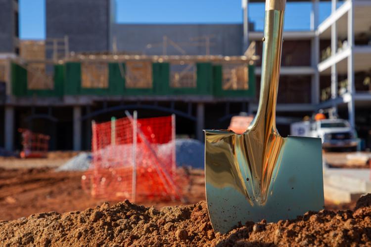Gwinnett, Snellville officials break ground on new library in Towne ...