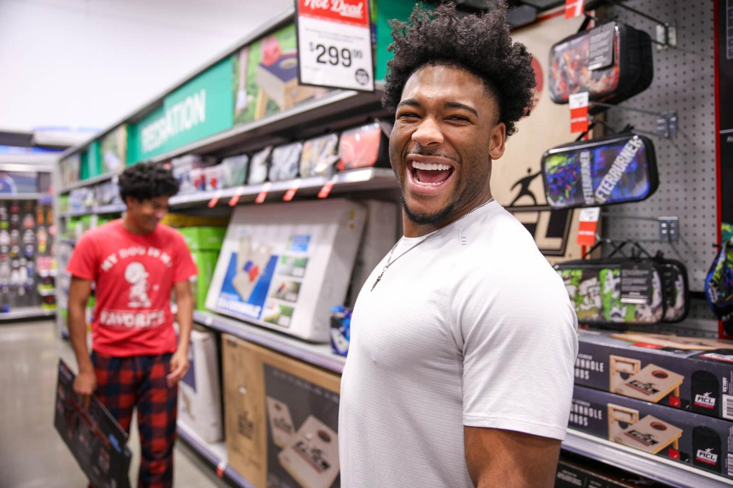 PHOTOS: Former Buford star Justice Haynes spreads holiday cheer at ...