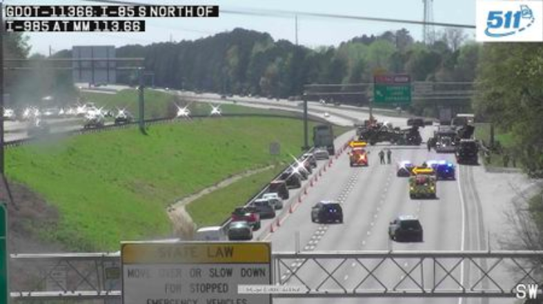 Tractor trailer overturns on I-85 south at I-985 split after collision ...