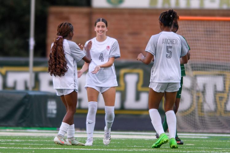 Libby Hutzell follows 4 older brothers' path to Archer soccer success ...