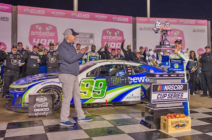 Daniel Suarez Wins Atlanta Race In Three-Wide Photo Finish | Sports ...