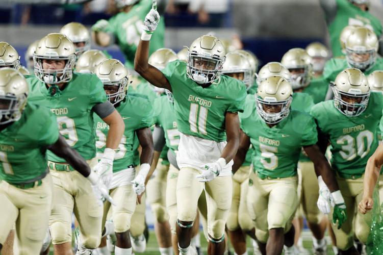 Buford football bounces back from early deficit to maul Hillgrove 48-17 ...