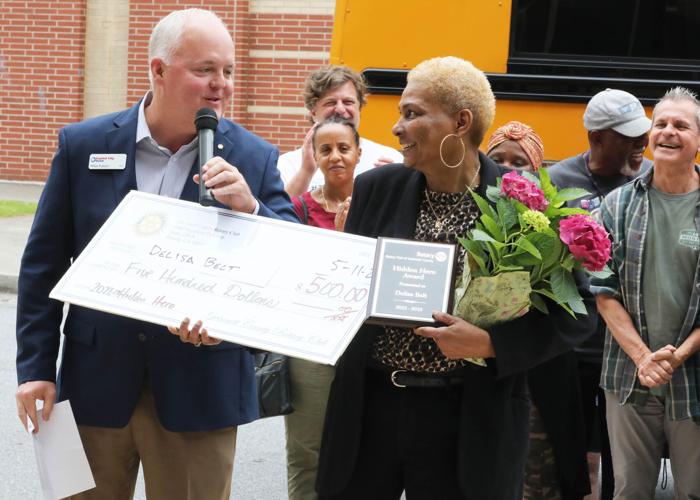 Rotary Club of Gwinnett honors GCPS bus driver with Hidden Hero Award ...