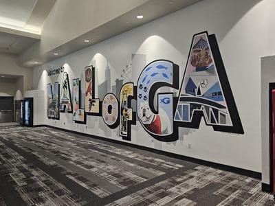 Gwinnett artist paints homage to Atlanta area culture with Mall of ...
