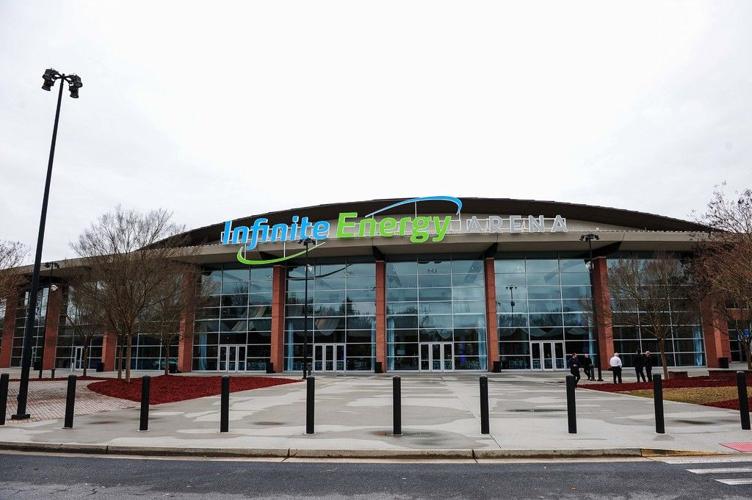 Officials celebrate installation of new Infinite Energy Arena signs ...