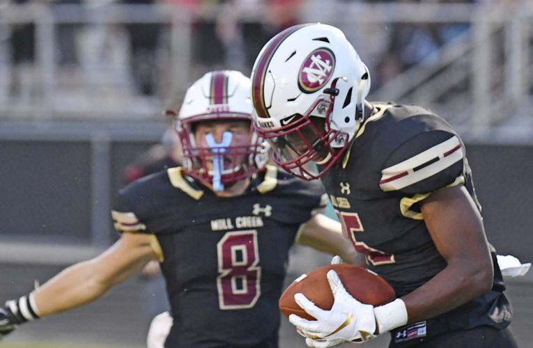 Mill Creek football rolls to fourth straight win over rival Dacula ...