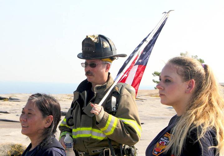 Barrow County firefighter climbs Stone Mountain to honor 9/11 victims ...