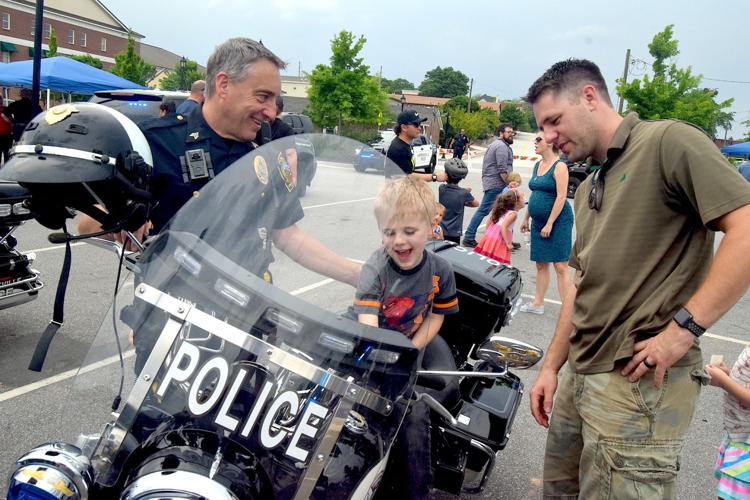 Lawrenceville cops, residents come together as a community at annual ...