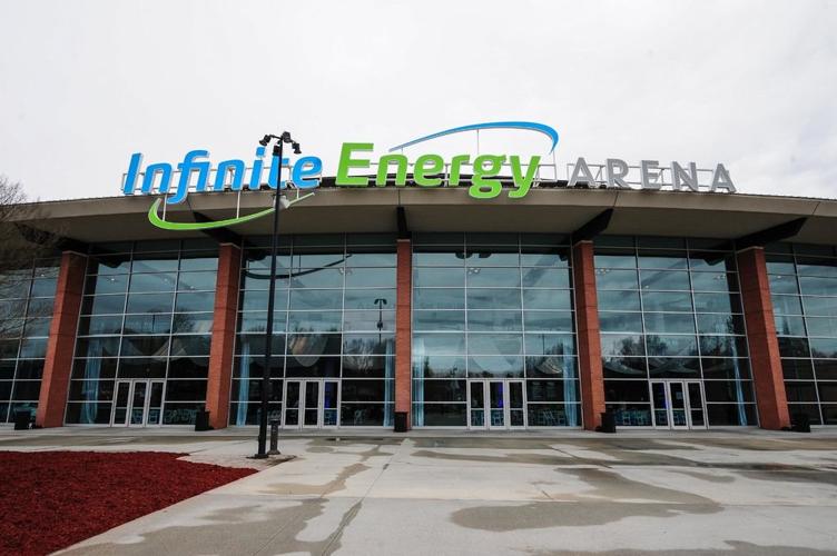 Officials celebrate installation of new Infinite Energy Arena signs ...