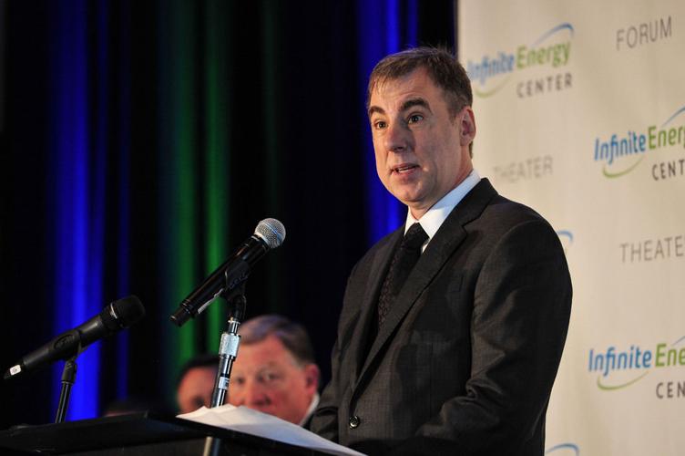 Officials celebrate installation of new Infinite Energy Arena signs ...