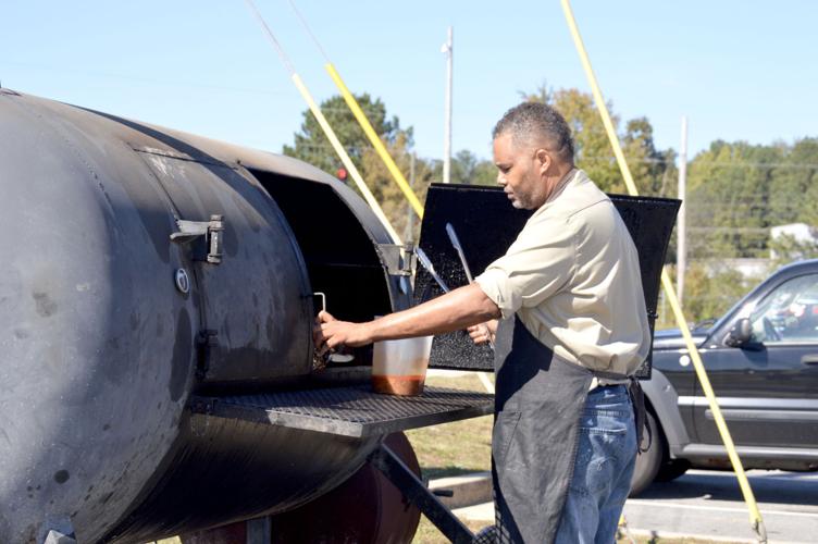Celebrity chef Jason Ellis serves up barbecue in Lawrenceville | News ...