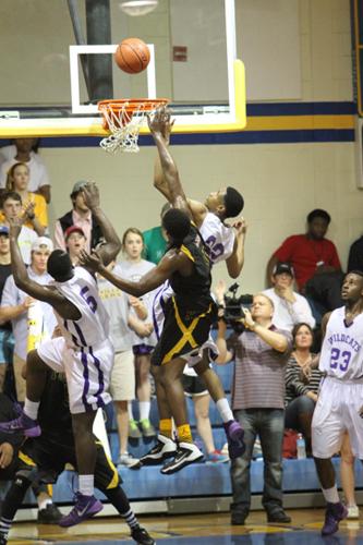 Neville vs. Wossman (Boys Basketball) | The Ouachita Citizen | hannapub.com