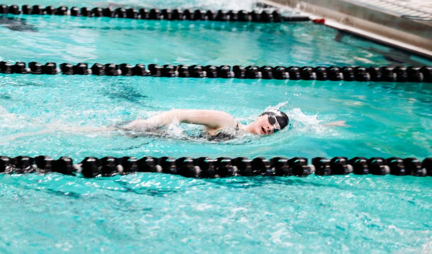 Pirates put up good showing at state swim meet, Johnson sets school ...