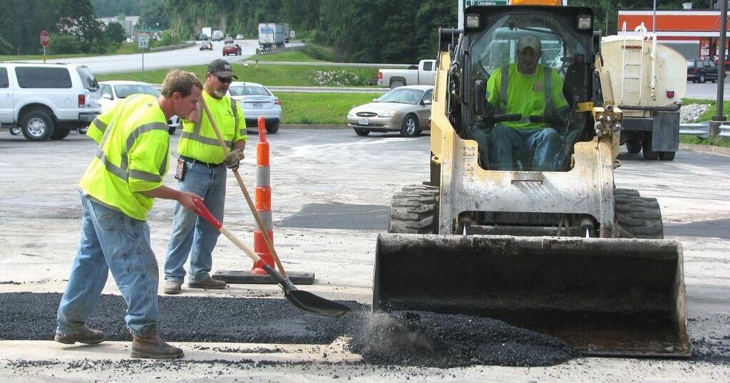 Chester Bross Construction employees repair Walgreens parking lot in ...
