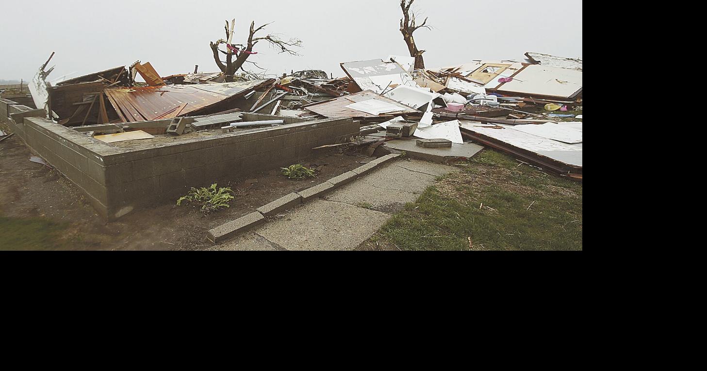 Sutton residents survey debris and memories scattered by weekend ...