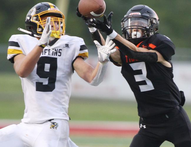 Tigers score once more following postponement, down Gretna East 23-13 ...