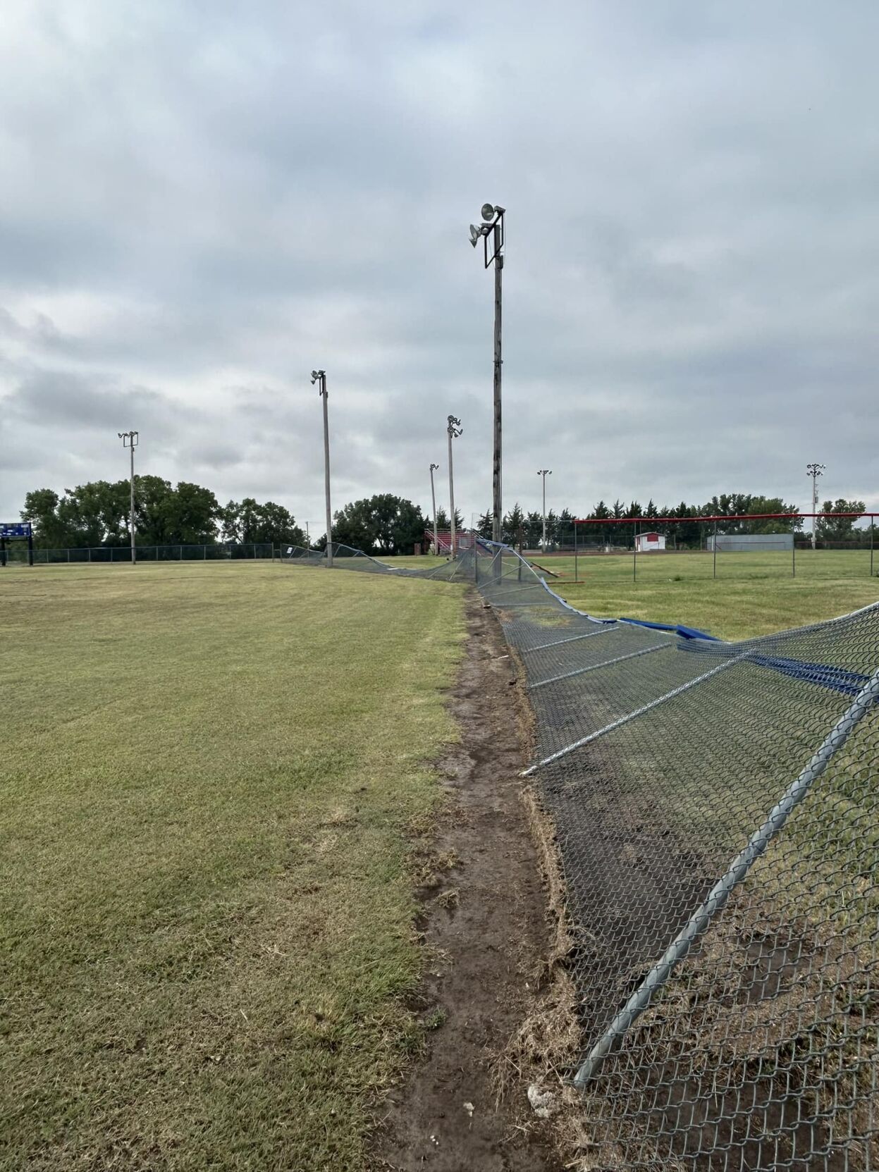 Baseball team starts storm cleanup at Smith Center ballfields | News ...