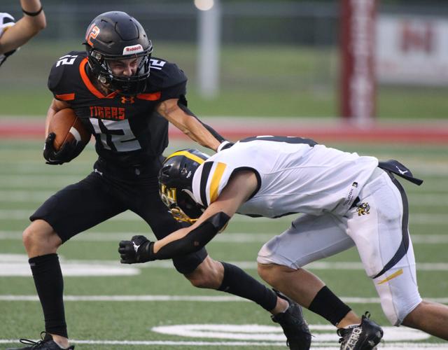 Tigers score once more following postponement, down Gretna East 23-13 ...